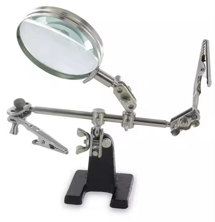 Tercera mano con lupa - M. Martín Rojas S.L